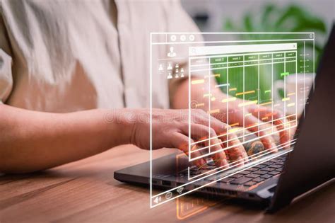 Man Working Data Analytics With Computer In Business Management System
