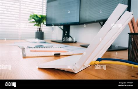 Modern Wi Fi Router On Light Table In Home Office Stock Photo Alamy