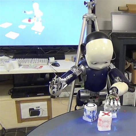 Icub Robot Manipulating An Object On The Reactable From The Download Scientific Diagram