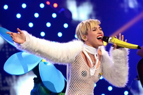 Miley Cyrus Wearing Very Revealing Mesh Outfit At Iheart Radio Music