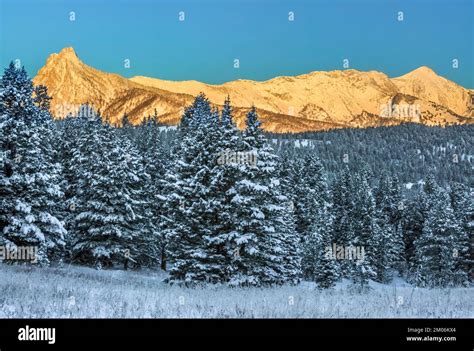 First Light On The Bridger Range In Winter Near Bozeman Montana Stock