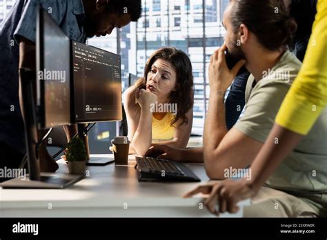 It Staff Members Gathered Together To Conduct Code Review To Fix Bugs Identifying Technical