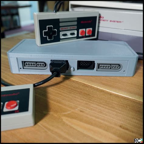 Super Ctrldock Nes And Snes Interface In Grey Enclosure