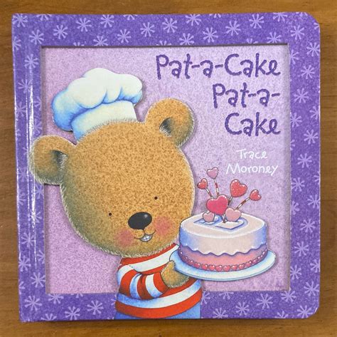 moroney trace pat a cake pat a cake board book mockingbird lounge