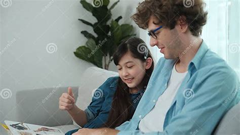Happy Daughter Lean On Father Shoulder While Listening Story Telling