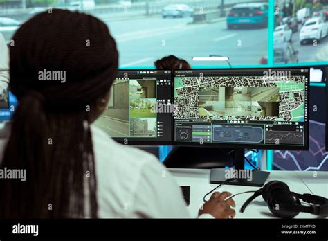 Agency Employee Following City Traffic On Her Computer By Using CTV Video Footage Ensuring