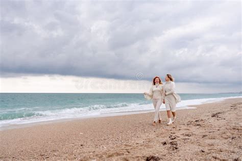 Women Sea Walk Friendship Spring Two Girlfriends Redhead And Blonde