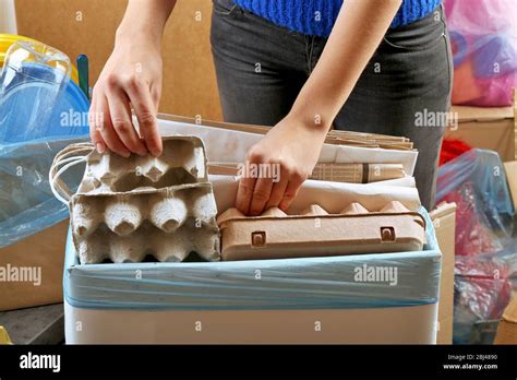 Woman Sorting Waste Close Up Stock Photo Alamy