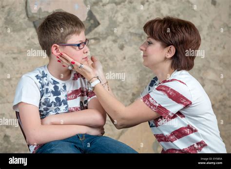 Mother And Son Teenager Looking At Each Other Stock Photo Alamy