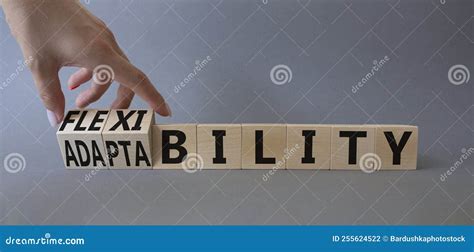 Flexibility And Adaptability Symbol Businessman Hand Turnes Cubes And