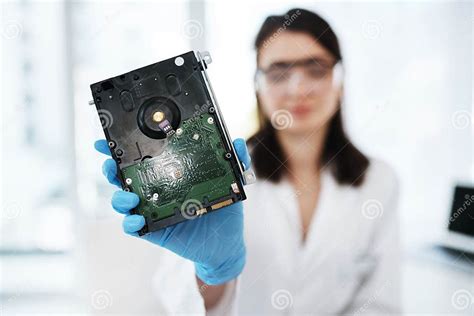 Repaired And Ready For Use A Young Woman Repairing Computer Hardware In A Laboratory Stock