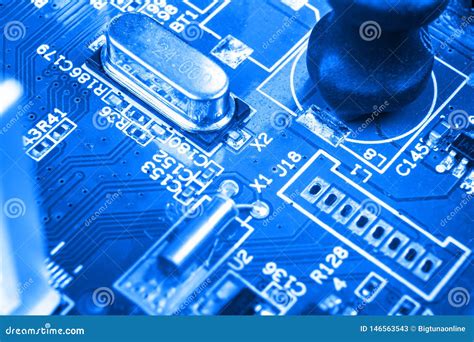 macro shot of circuit board with resistors microchips and electronic