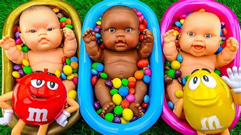 Satisfying Asmr Red And Yellow Mandms Candy Mixing And Sweet Slime In Bathtubs With Kinder Joy