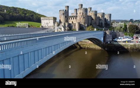 Aerial View Of Conwy Castle With Road Bridge In Morning Light Stock