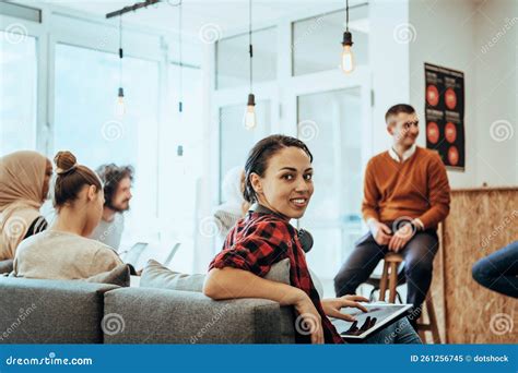 Group Of Multi Ethnic Colleagues Working On Desktop Computers Laptop And Sharing Their Ideas In
