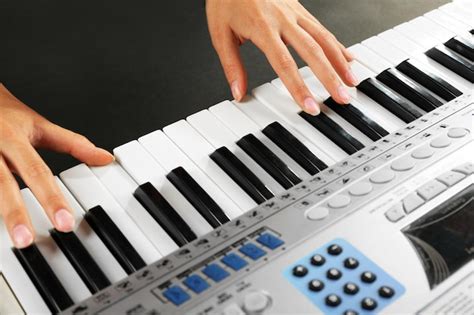 Premium Photo Woman Playing Synthesizer Close Up