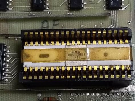 chip why did some mos 6502 packages have holes in them