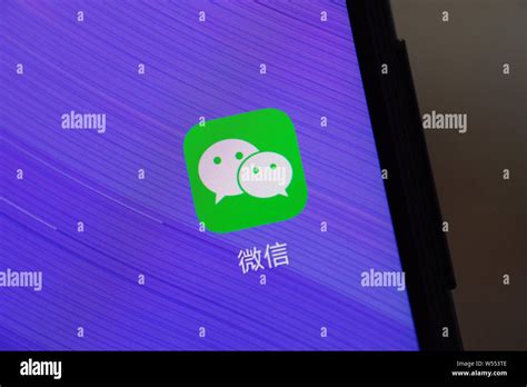 file a chinese mobile phone user shows the icon of messaging app
