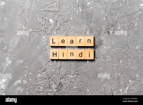 Learn Hindi Word Written On Wood Block Learn Hindi Text On Table Concept Stock Photo Alamy