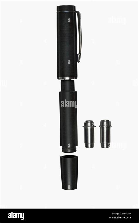 Pen And Two Bullet Casings Stock Photo Alamy