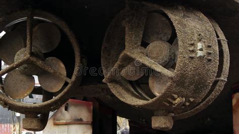 Corroded Ship Propellers Await Refurbishment In Dry Dock Marine Repair