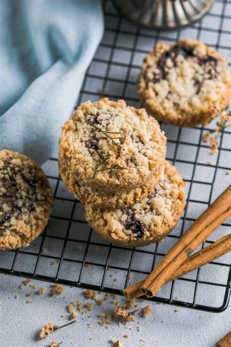 Round Festive Pastry Buiscuits Cookies With A Raspberry Jam On A Light Grey Background Stock