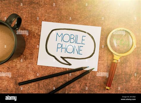 Conceptual Caption Mobile Phone Word Written On A Handheld Device Used To Send Receive Calls