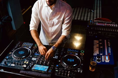 Crop Dj Plays Live Set And Mixing Music On Turntable Console In The