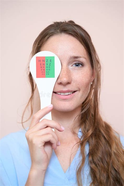 Elegant Caucasian Female Is Checking Her Visual Acuity In The Medical