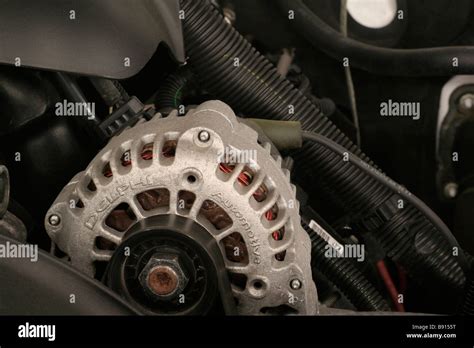 Delphi Automotive Alternator Installed On New Engine Stock Photo Alamy