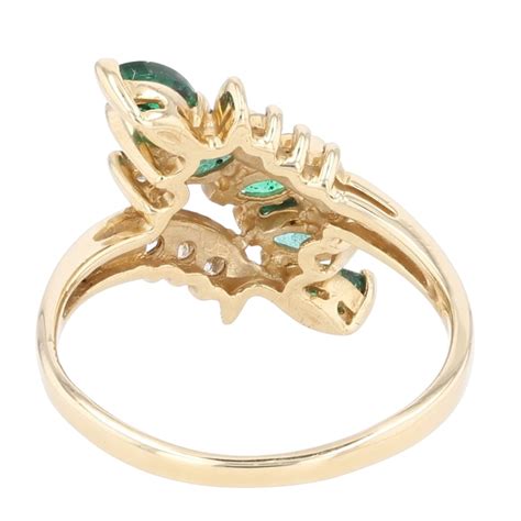76ctw Marquise Cut Emerald And Diamond Bypass Ring 14k Yellow Gold