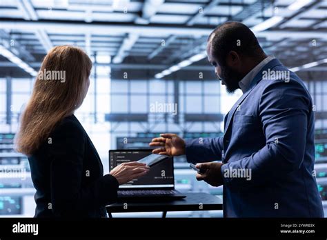 Admin And Manager Doing Disaster Recovery Planning And Security