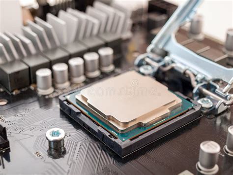The Process Of Connecting The CPU To The Processor Socket On A Modern Computer Motherboard