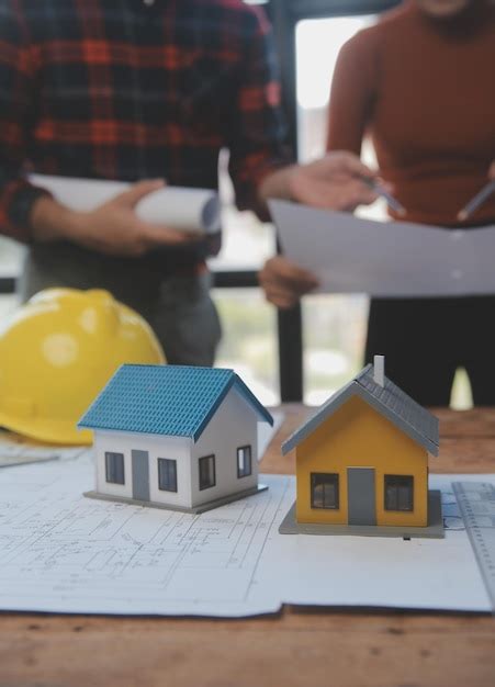 Premium Photo Engineer Teamwork Meeting Drawing Working On Blueprint Meeting For Project