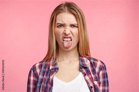 Dissatisfied Female Model Frowns Face Has Disgusting Expression Shows