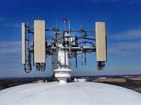Cell Phone Antenna Array Mounted On Top Of A Water Tower Stock Image
