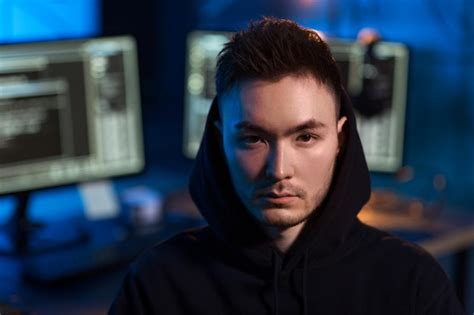 Premium Photo Asian Hacker In Dark Room With Computers At Night