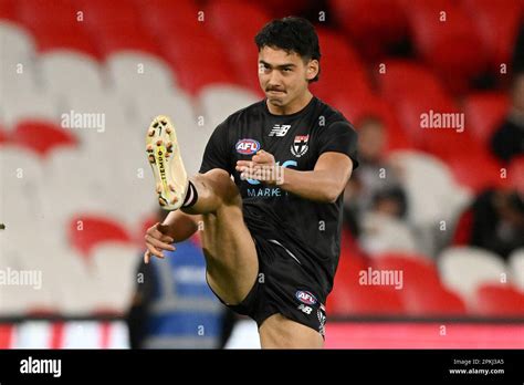 Mitch Owens of the Saints warms up ahead of the AFL Round 4 match ...
