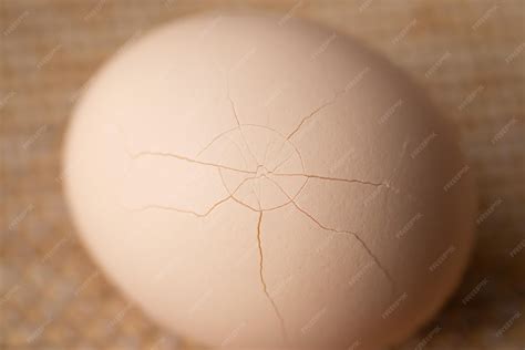 Premium Photo Close Up Of Chicken Egg With Big Crack Birth Of Chicken