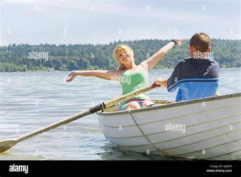 Babe And Girl In Row Boat Stock Photo Alamy