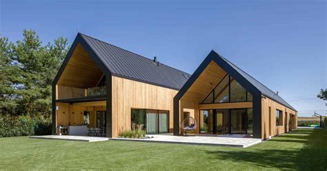 A House Designed Like Two Barns Beside Each Other Architecture Collection