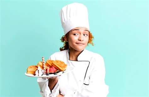 Premium Photo Red Hair Pretty Chef Woman Cooking Waffles