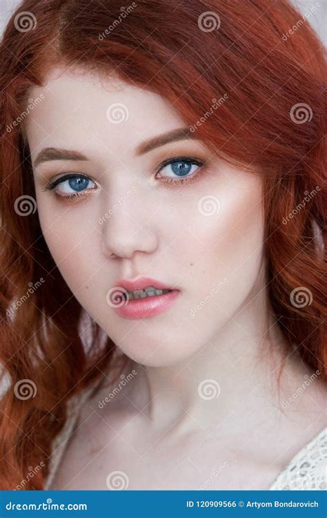 Tender Retro Portrait Of A Young Beautiful Dreamy Redhead Woman Stock