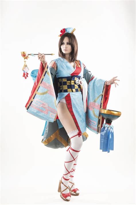 Beautiful Leggy Busty Cosplayer Girl Wearing A Stylized Japanese Kimono