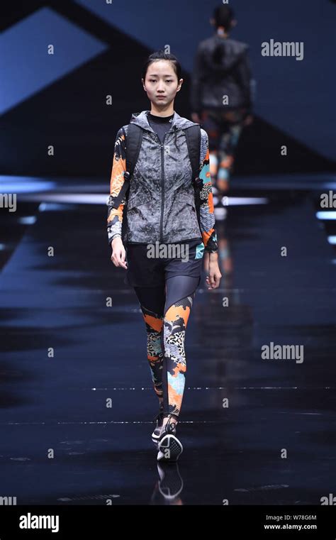 A Model Displays A New Creation At The Fashion Show Of Xiang Shang Sport By Huang Jieming During