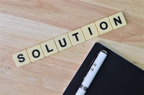 premium photo square letters with text solution over wooden background