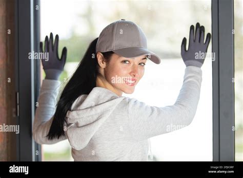 Female Builder Installing A Window Stock Photo Alamy