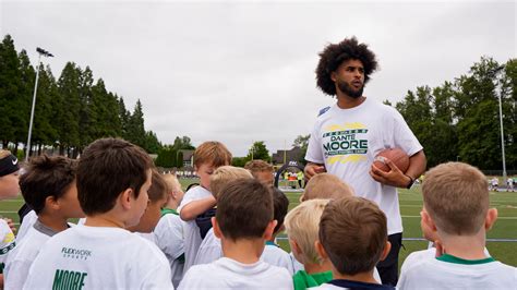 See Photos As Dante Moore Leads Youth Football Camp In Eugene