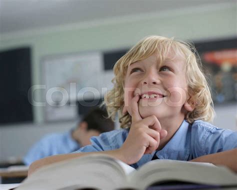 School Boy Thinking In Class Colourbox