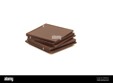 Stack Of Thin Square Pieces Of Chocolate Isolated On White Background